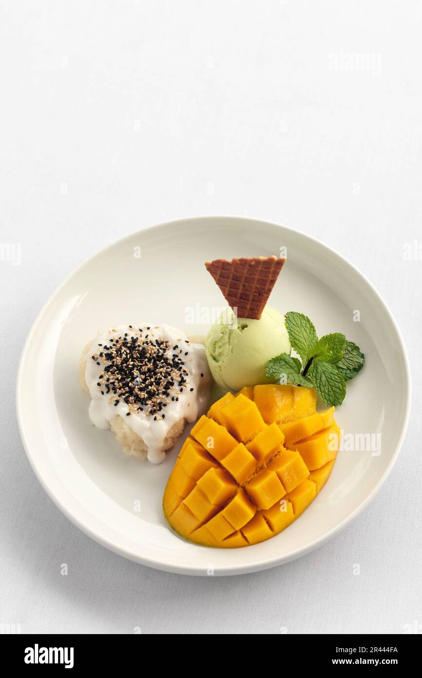 Mango with Sticky Rice and Pandan ice cream Thai famous dessert Stock ...
