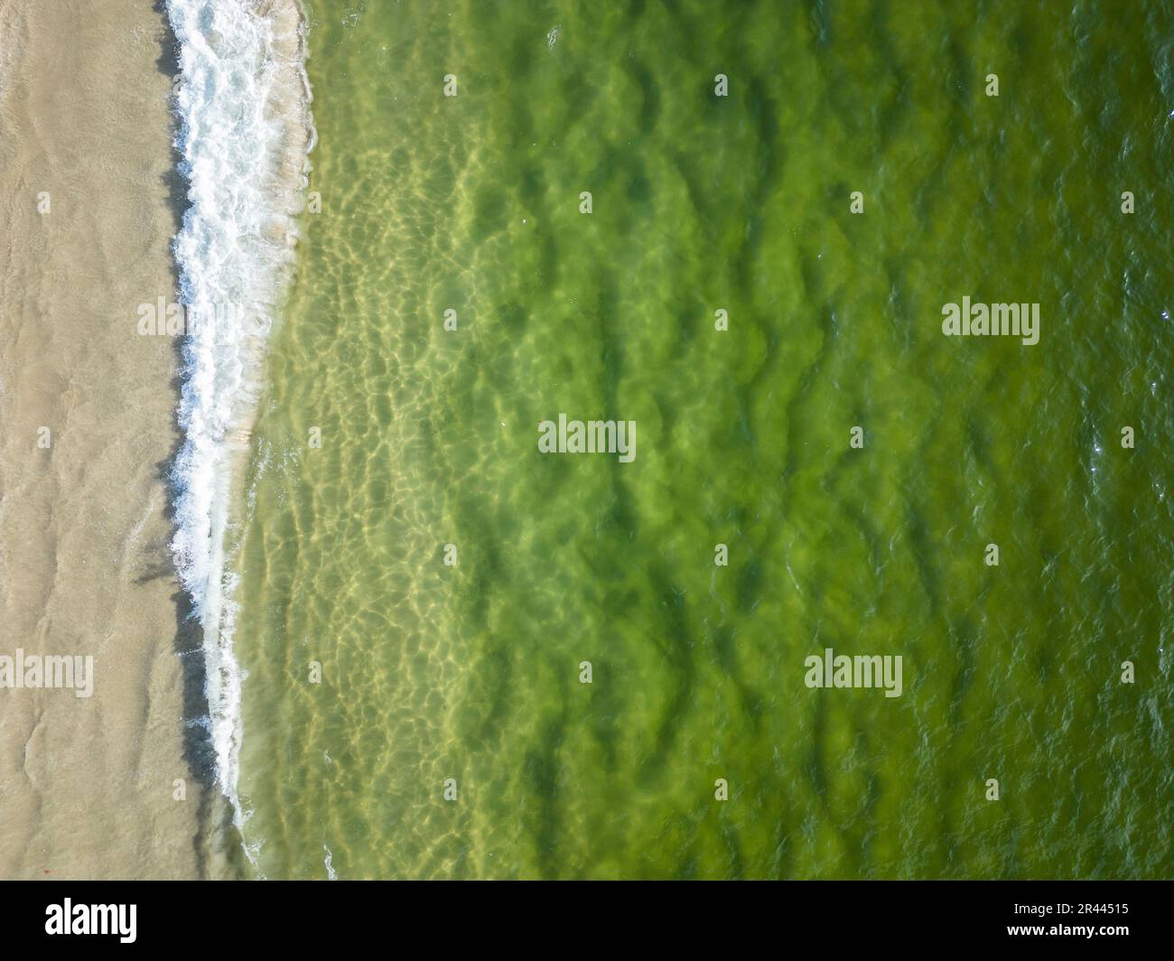 Beautiful aerial top down view to green ocean water and sand Stock ...