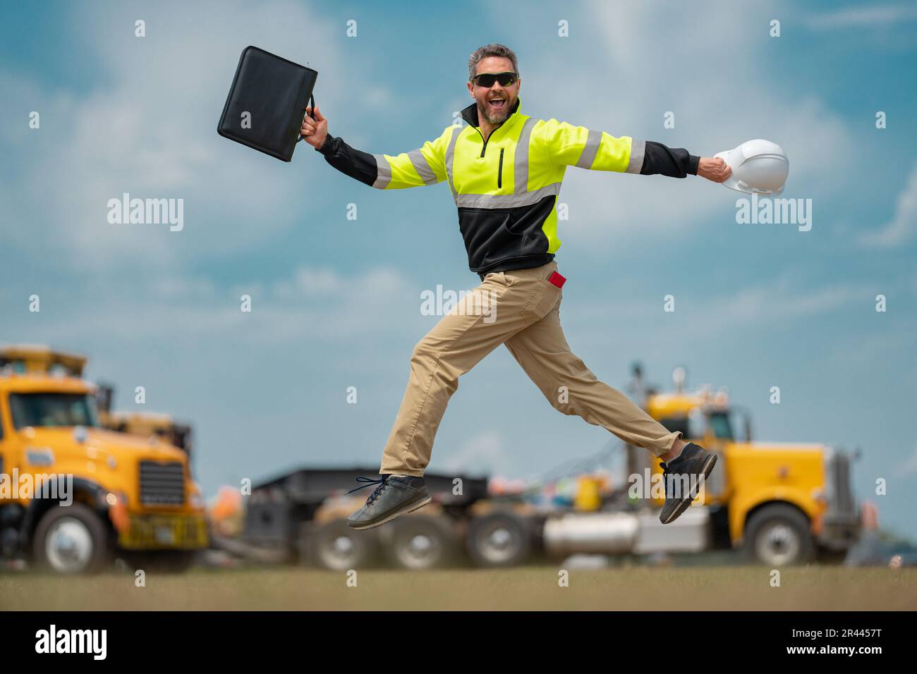 Construction builder excited jump hi-res stock photography and images ...