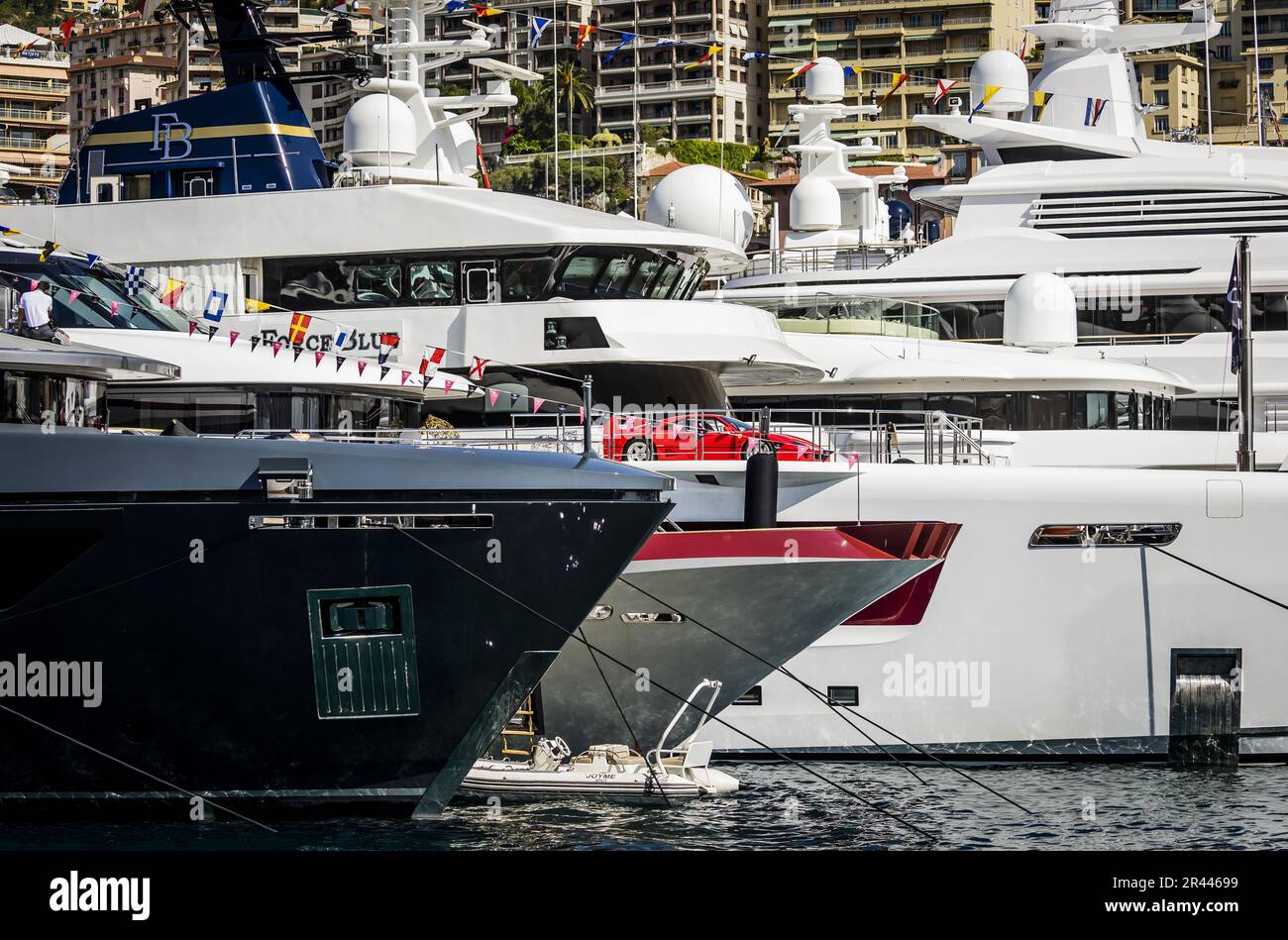 Monaco. May 26, 2023. A boat carrying a Ferrari F40 in the harbor of ...