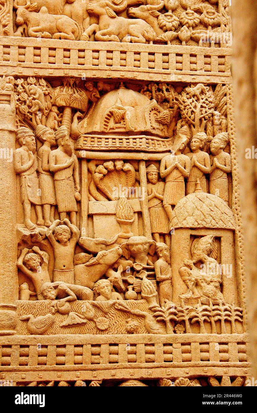 View of sculpture depicting life and culture on stone pillar at Stupa ...
