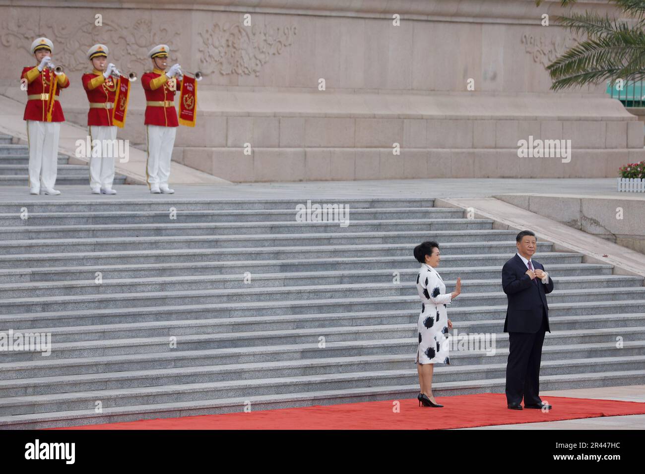 Chinese President Xi Jinping and his wife Peng Liyuan attend a ...