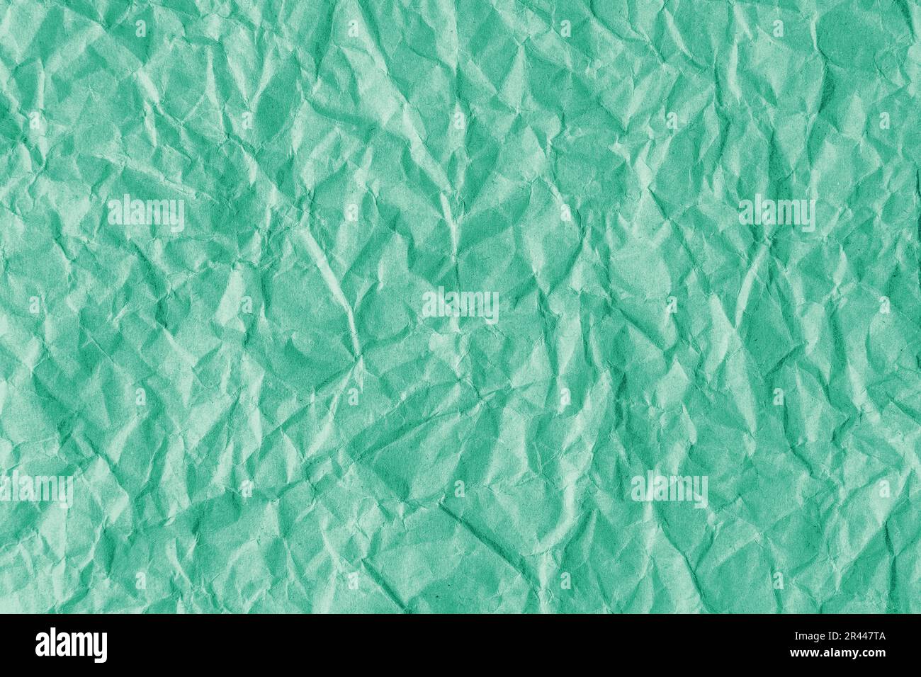 Recycled crumpled green paper texture background. Wrinkled and creased ...