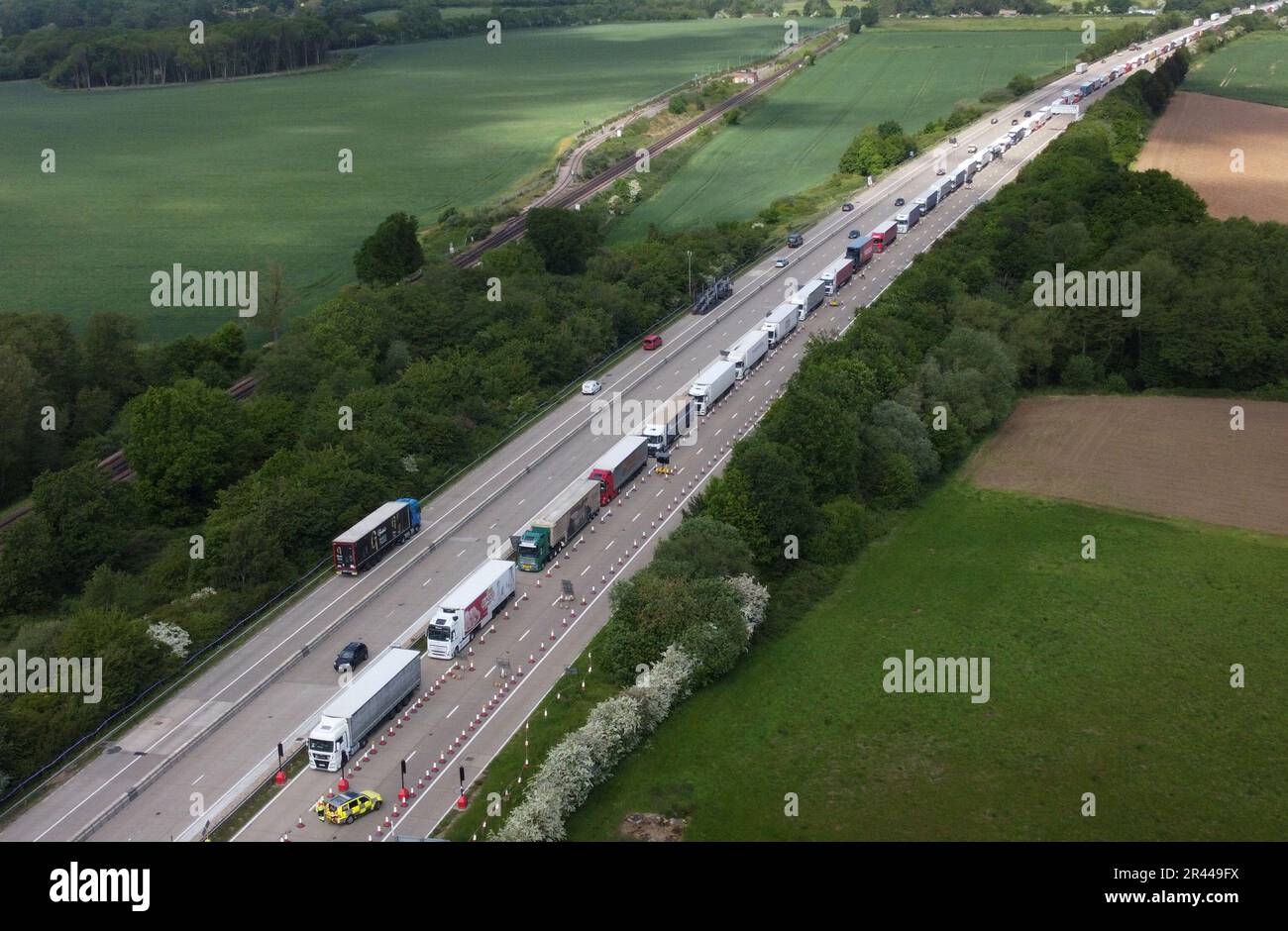 Lorries queue during Operation Brock on the M20 near Ashford in Kent as ...