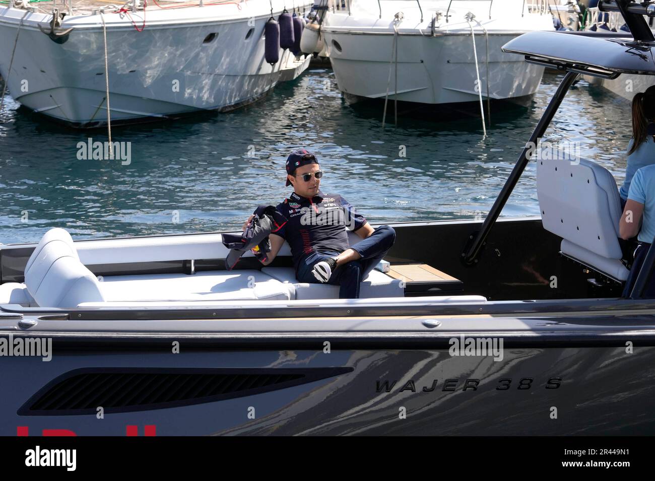Red Bull driver Sergio Perez of Mexico arrives by boat prior to the ...