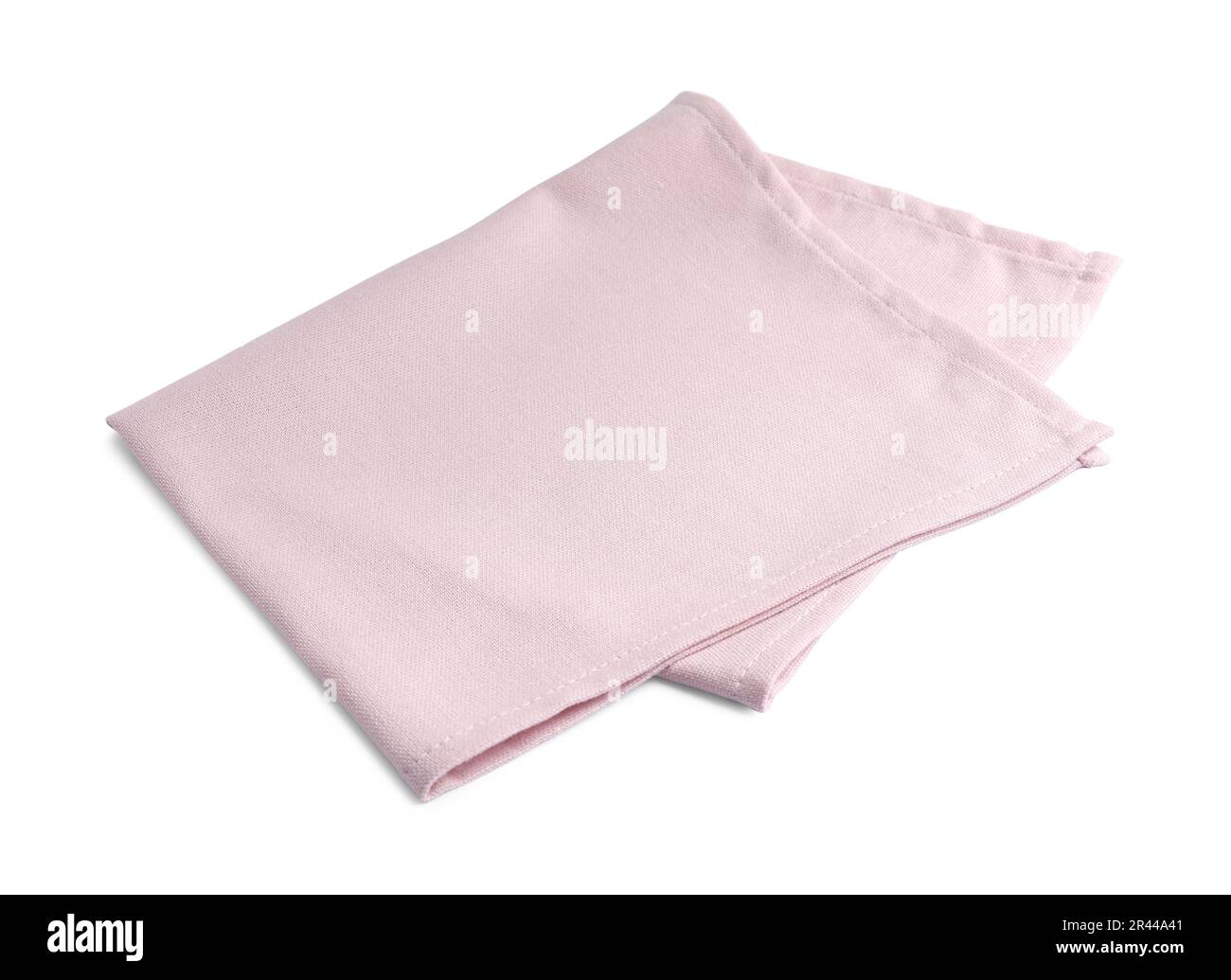 Pink fabric napkin folded on white background Stock Photo - Alamy