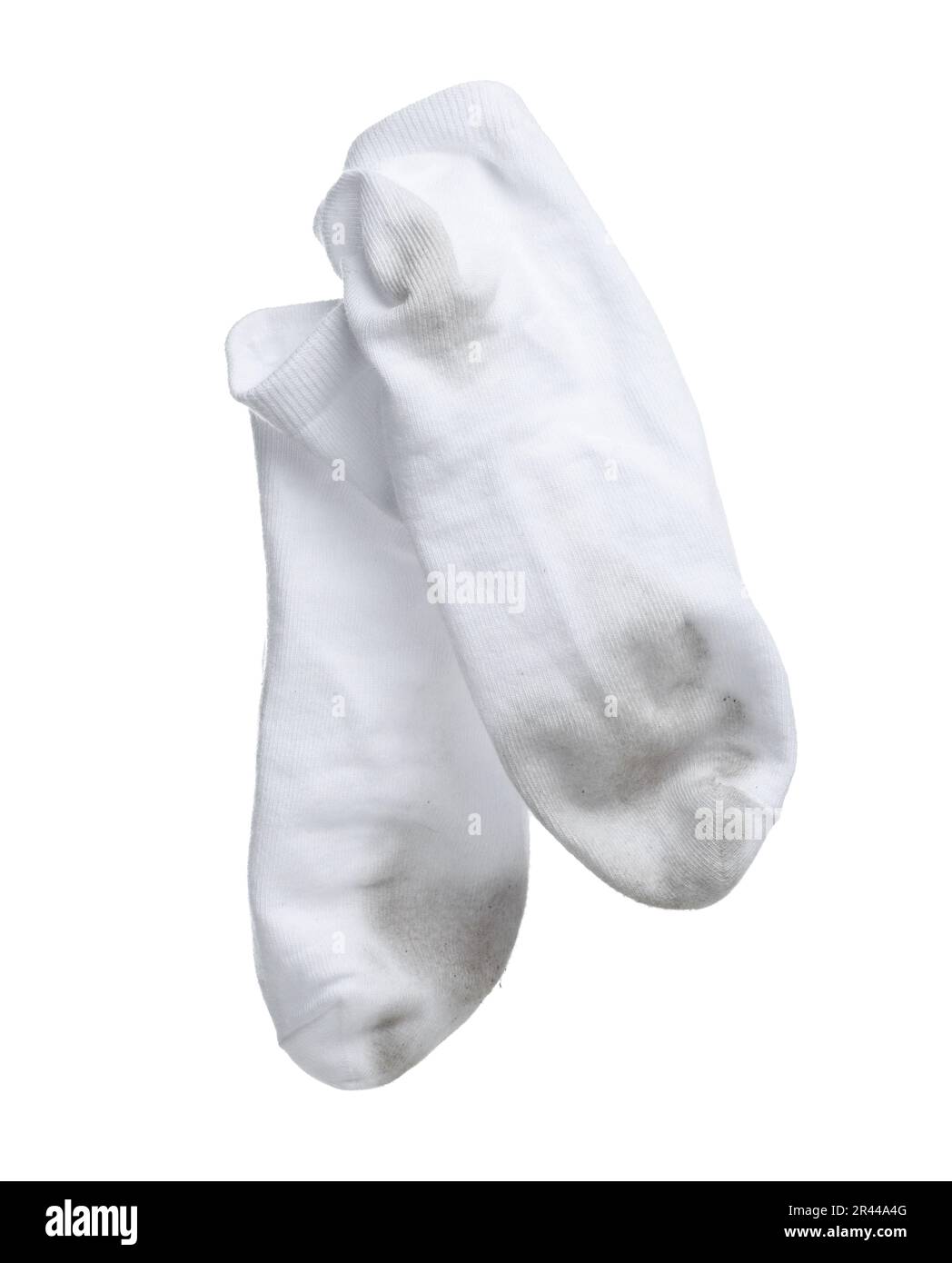 Pair of dirty socks on white background Stock Photo - Alamy