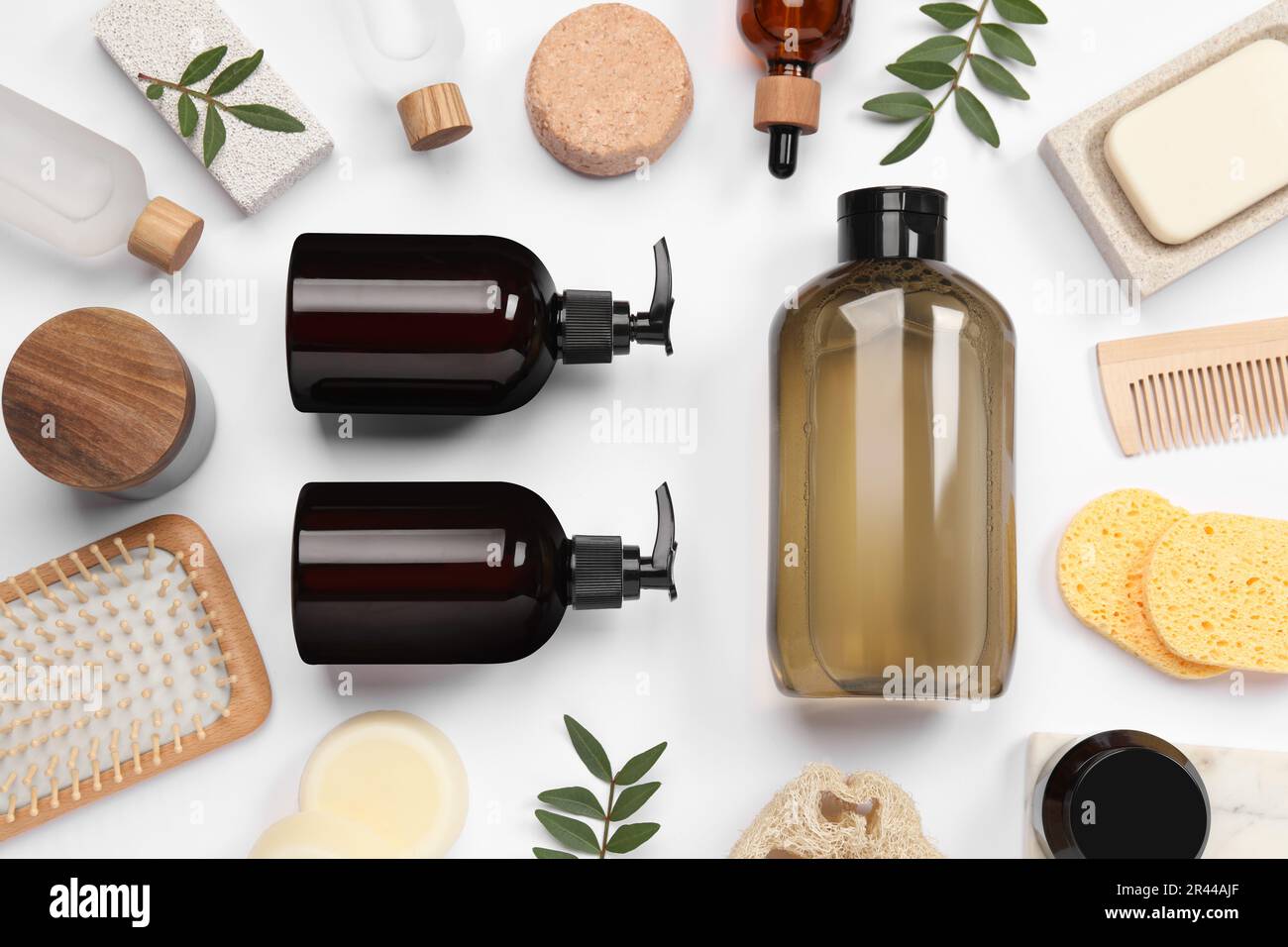 Flat lay composition with solid shampoo bar and bottles of cosmetic ...