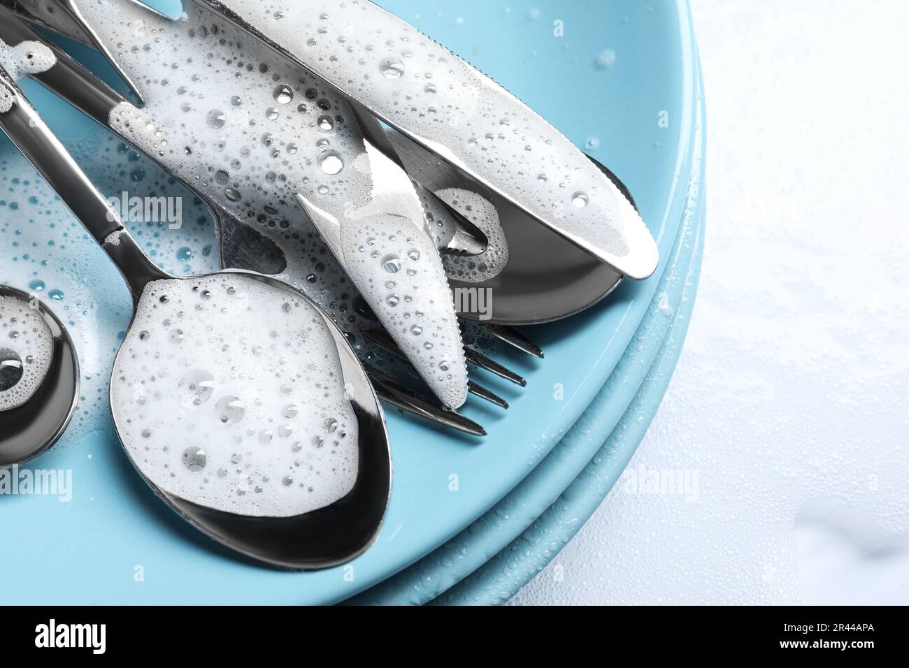 Dishwashing liquid clean plates hi-res stock photography and images - Alamy