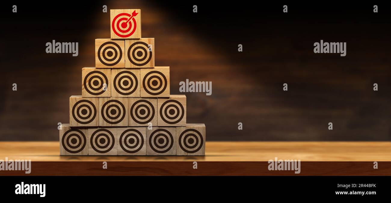 Stack of wooden blocks forming a pyramid, with many empty brown targets ...