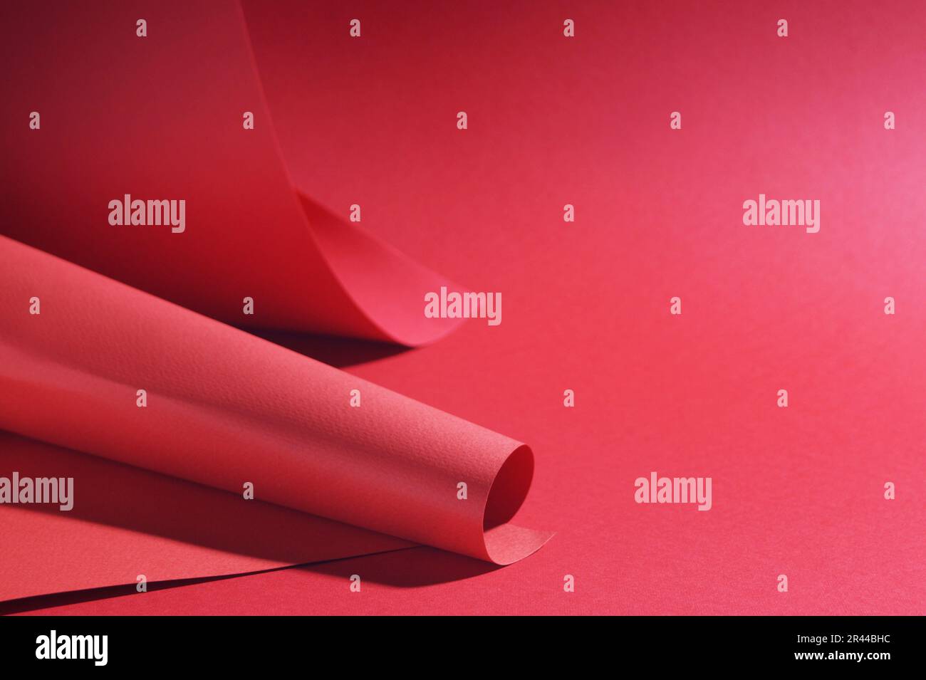 Paper sheets on red background, space for text Stock Photo - Alamy