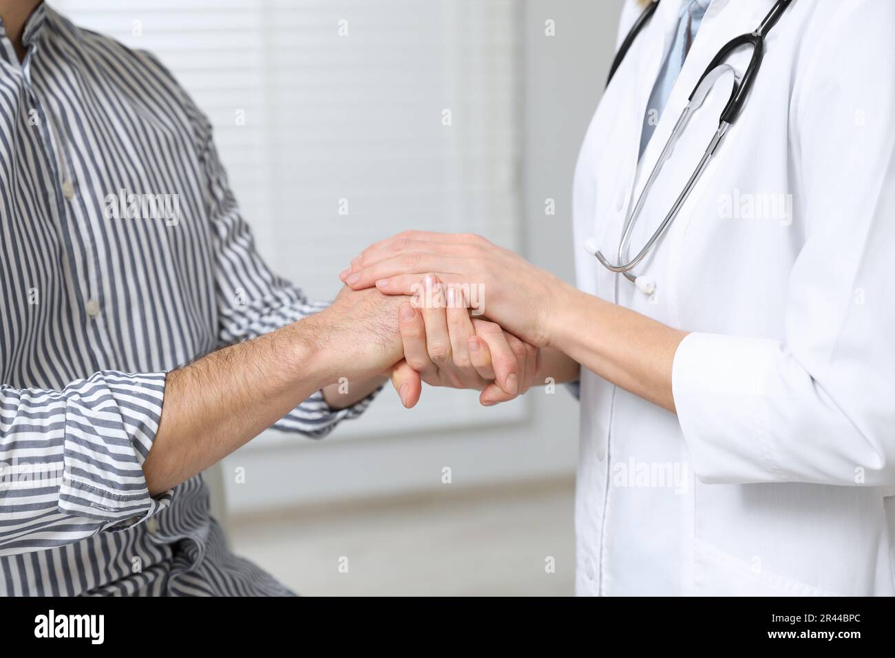 Patient having appointment with doctor in clinic, closeup Stock Photo ...