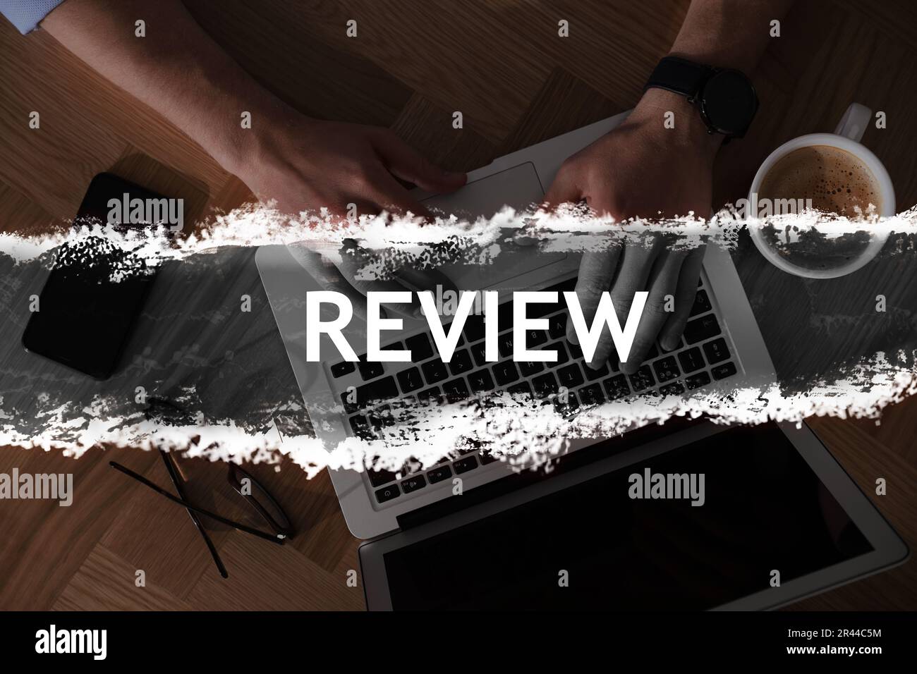 Online review. Man using laptop to leave feedback, top view Stock Photo - Alamy