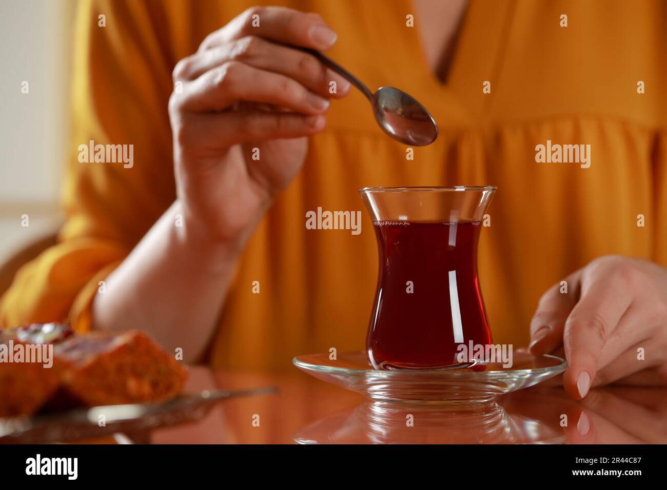 Woman drinking turkish tea hi-res stock photography and images - Alamy
