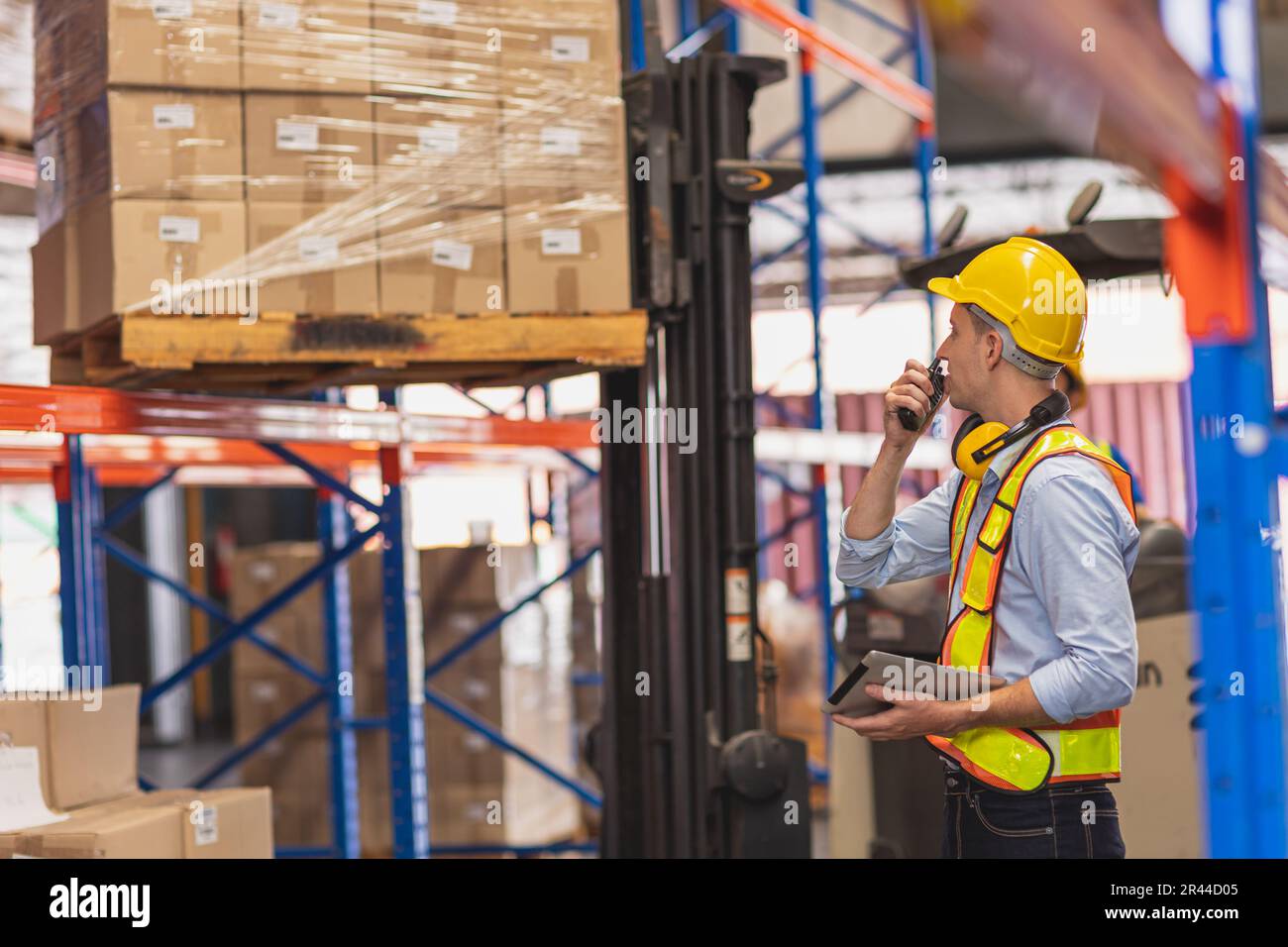 Factory Warehouse Worker Working Operate Loading Cargo In Shipping Area ...