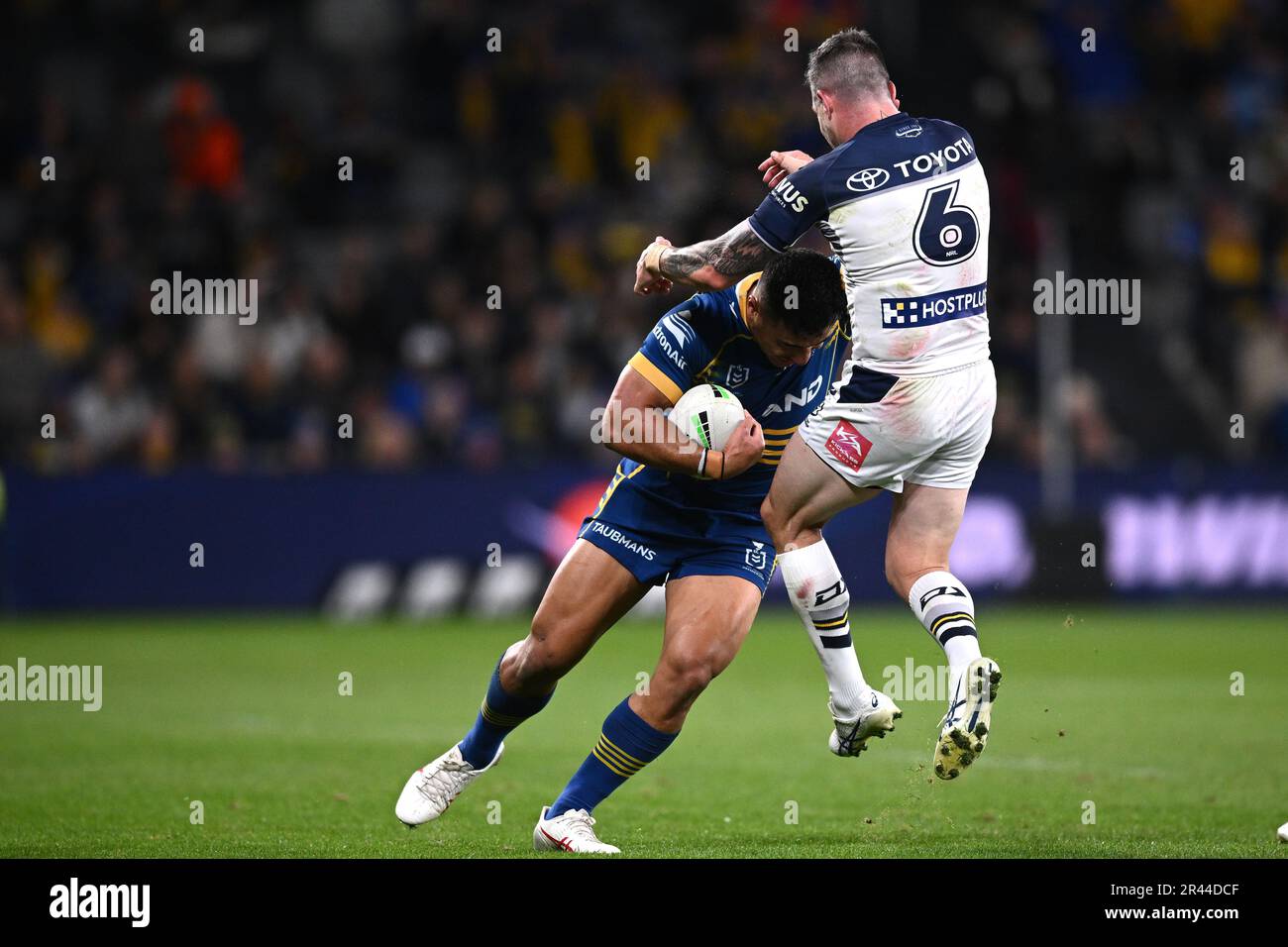 Sydney, Australia. 26th May, 2023. Will Penisini of the Eels fends off ...