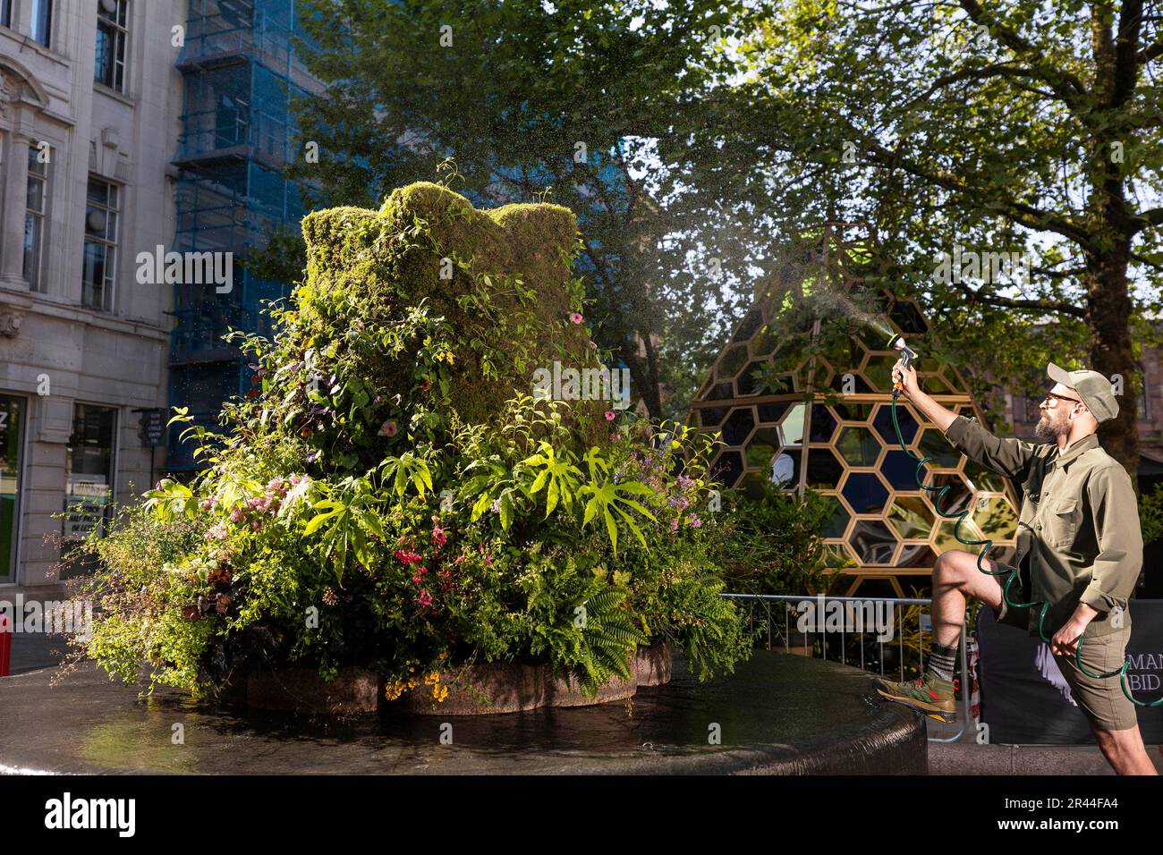 EDITORIAL USE ONLY David Jayet-Laraffe watering his design installation ...