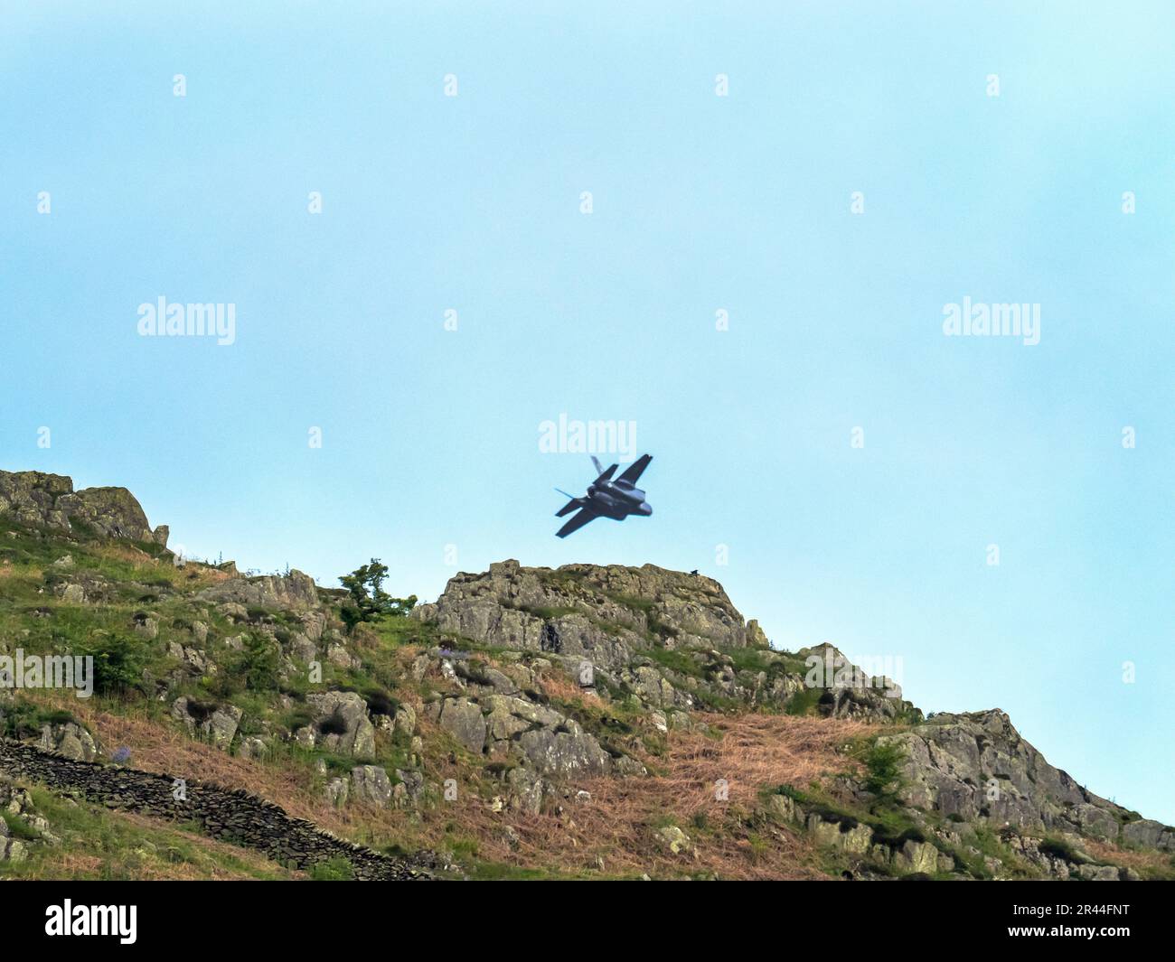 An american Air Force F35 flying over Ambleside, Lake District, UK ...