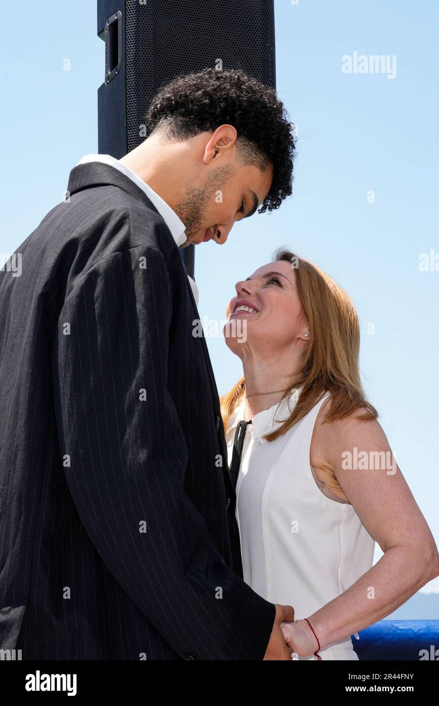 Archie Madekwe, left, and Geri Halliwell pose for photographers at the ...