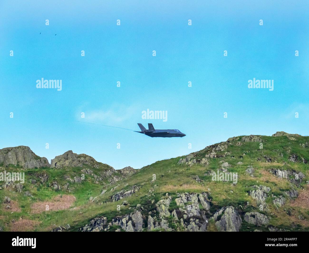 An american Air Force F35 flying over Ambleside, Lake District, UK ...