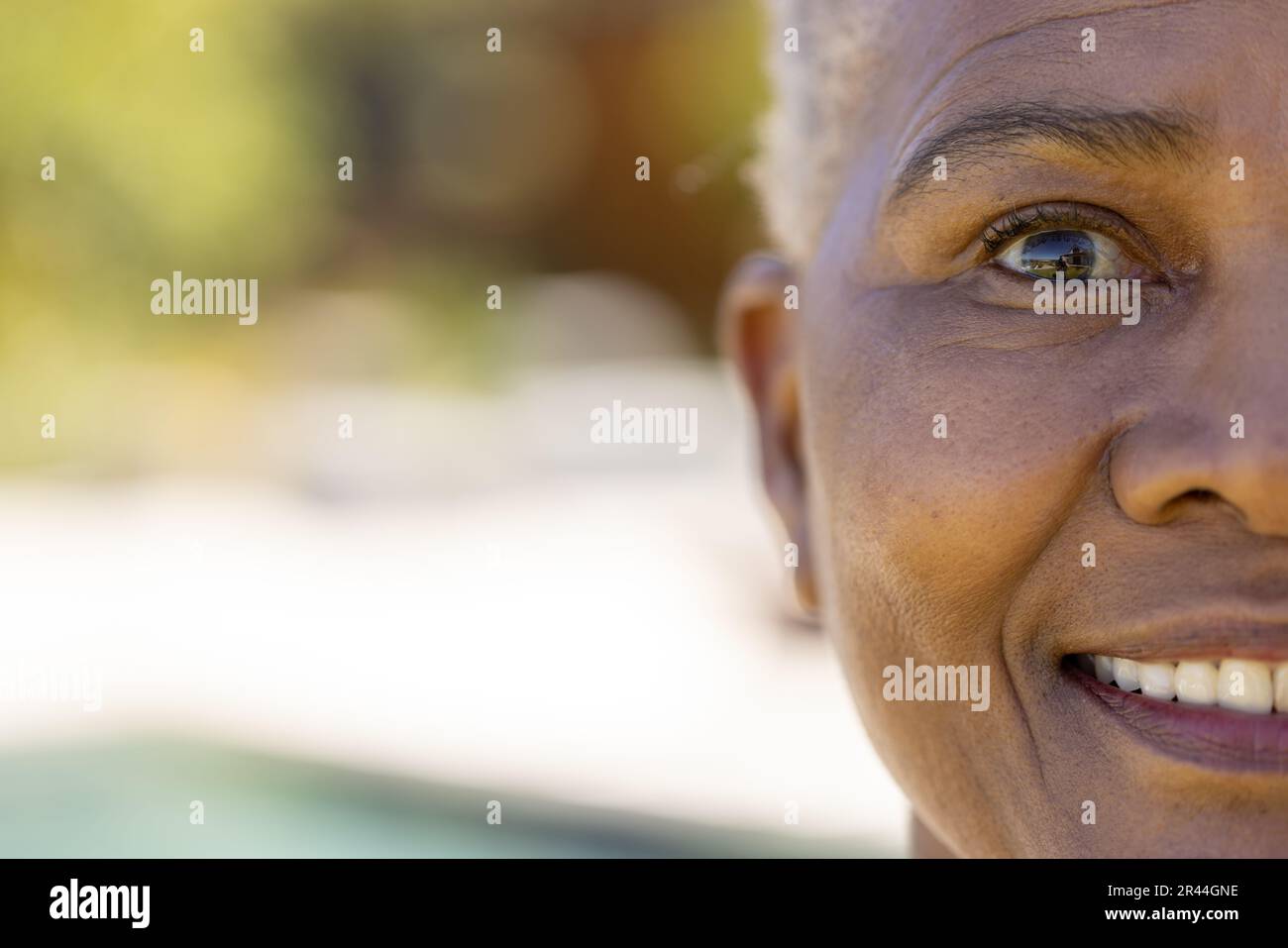 Half face smiling biracial young hi-res stock photography and images ...