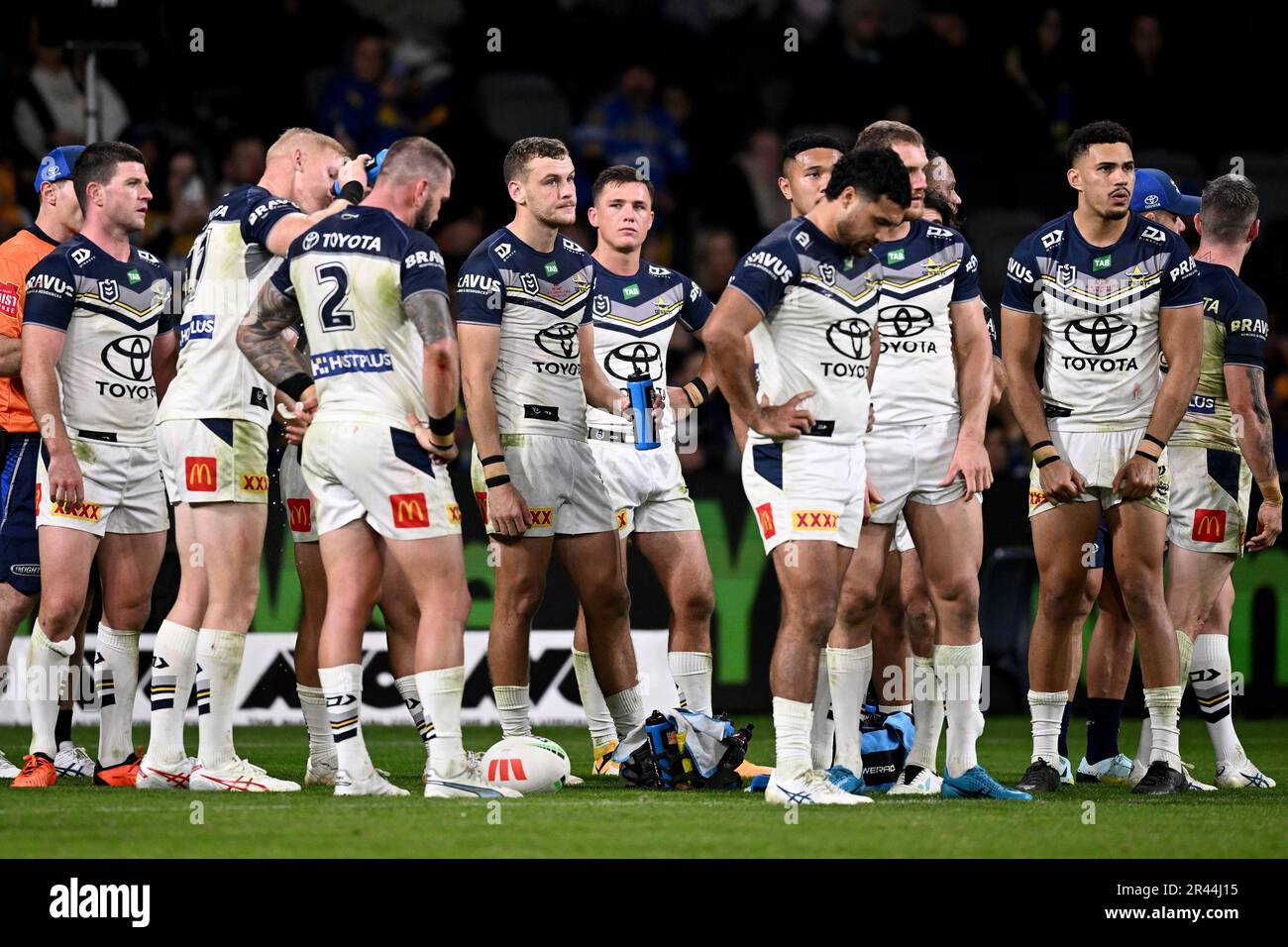 Sydney, Australia. 26th May, 2023. Cowboys players react after ...