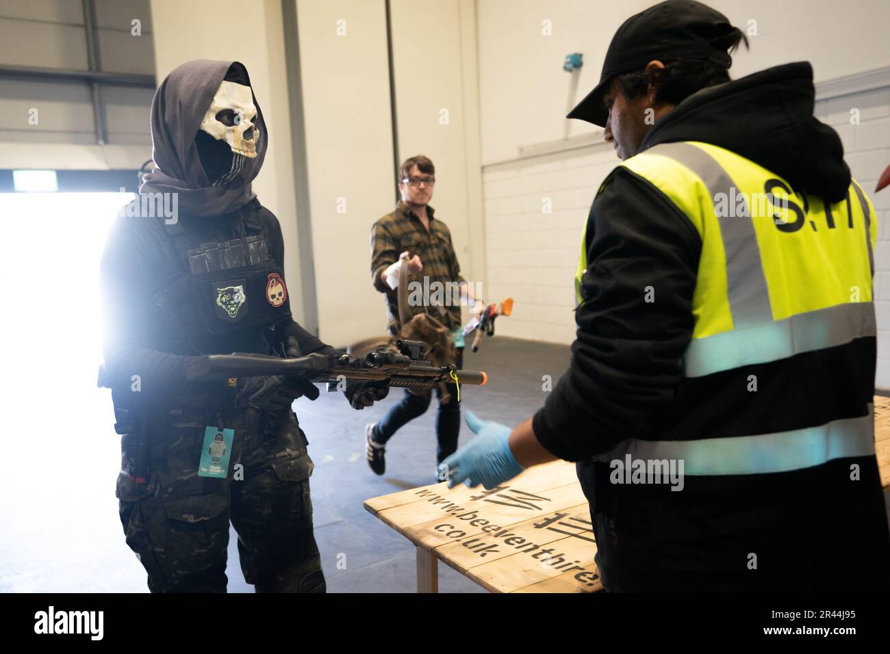 Security check replica guns during MCM Comic Con at the ExCel London in ...