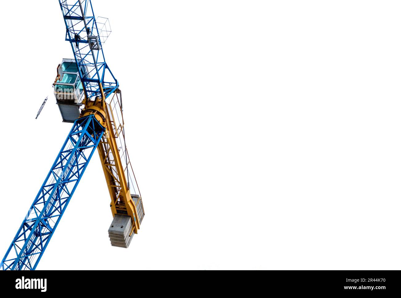 Construction Crane in blue and yellow color isolated in white ...
