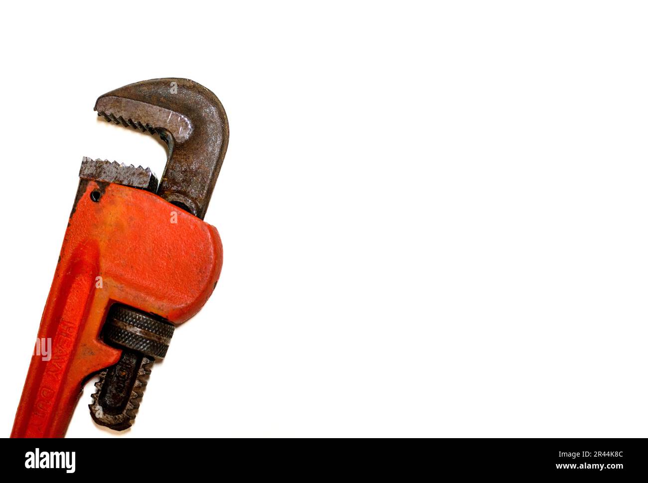 Red color spanner in isolated white background Stock Photo - Alamy