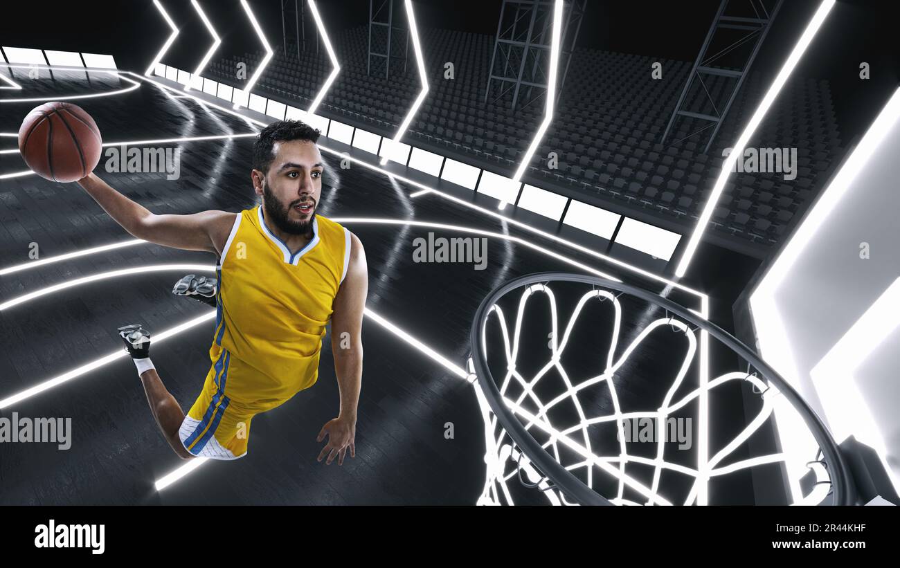 Dynamic image of young man, basketball player in yellow uniform ...