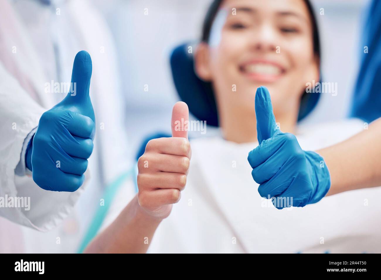 Dentist, thumbs up and happy patient in consultation for teeth ...