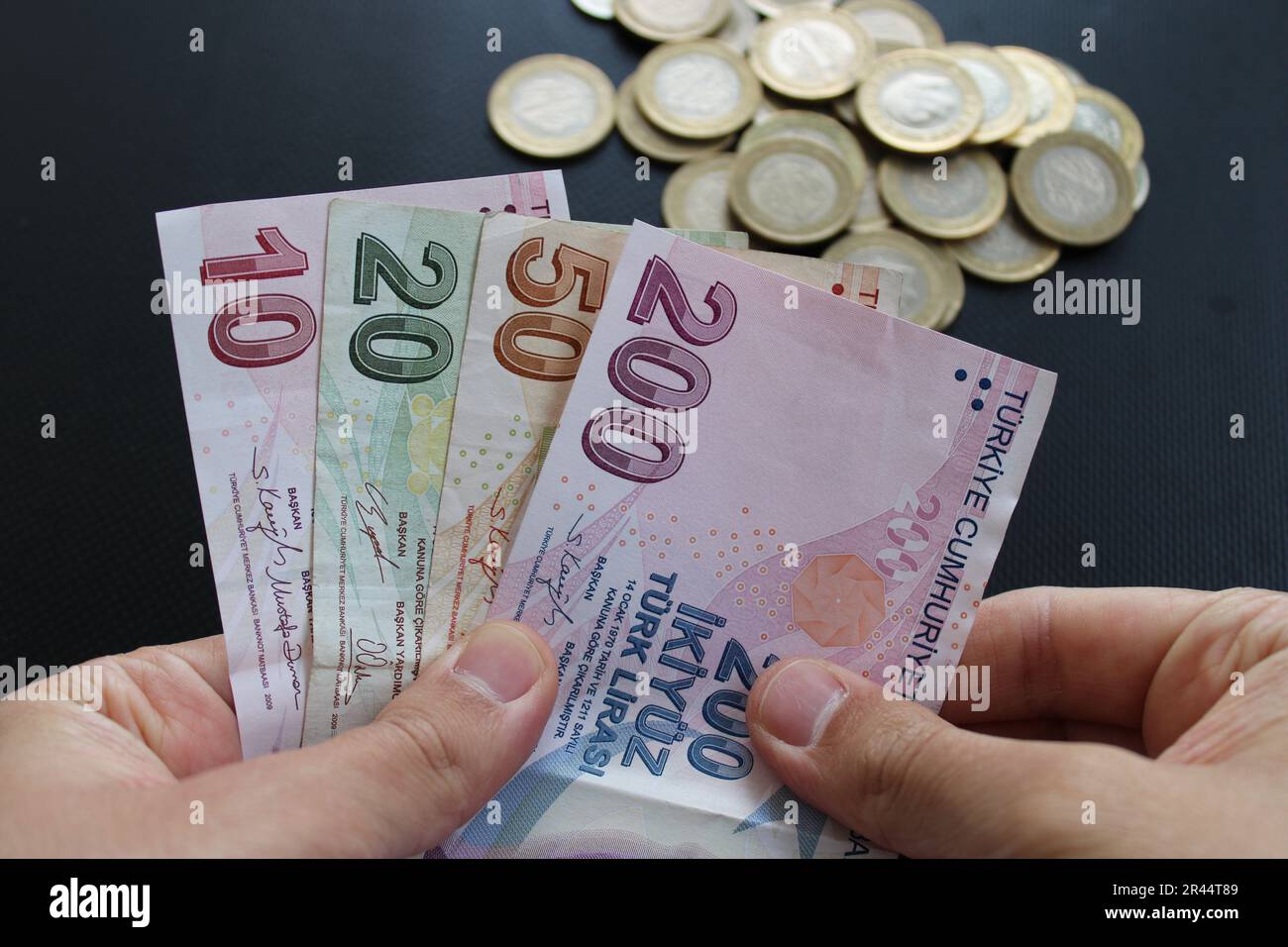 Hand with lira hi-res stock photography and images - Alamy