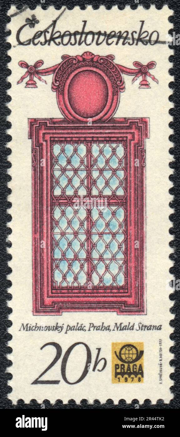 A stamp printed in Czechoslovakia shows Palace window in Prague, circa ...