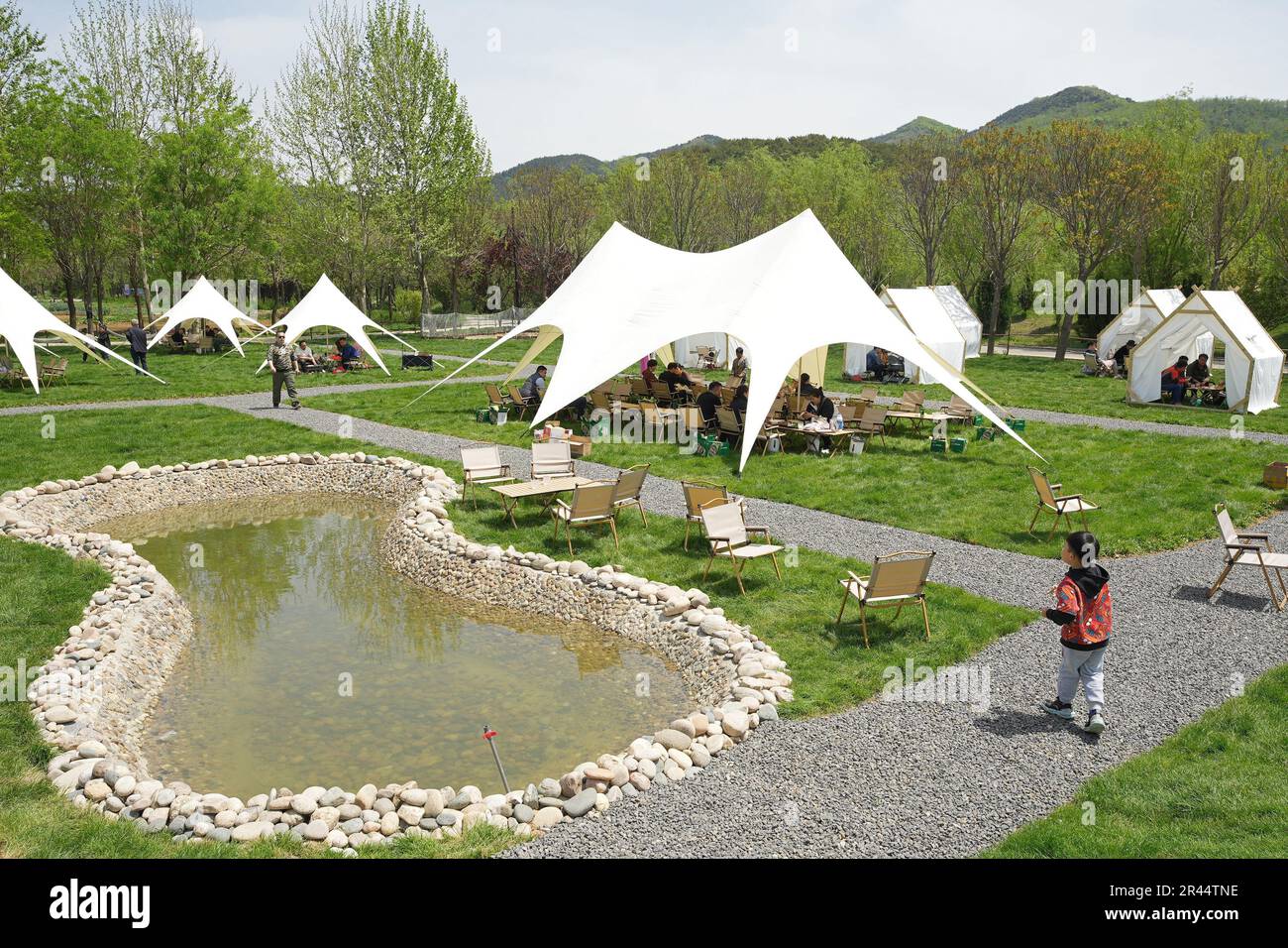 YANTAI, CHINA - MAY 7, 2023 - Tourists relax at a campsite in Yantai ...