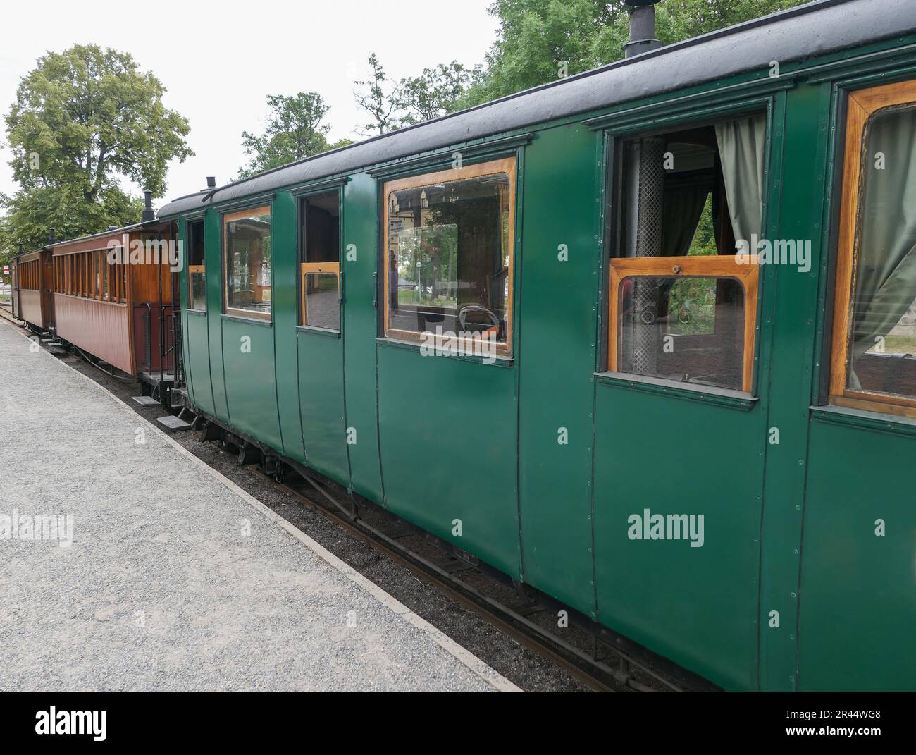a old train standing at station Stock Photo - Alamy
