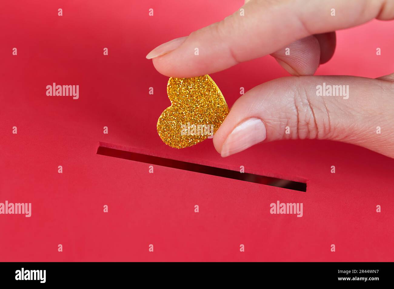 Red box Bank and Gold Heart, Concept love, Charity and Relief Work ...