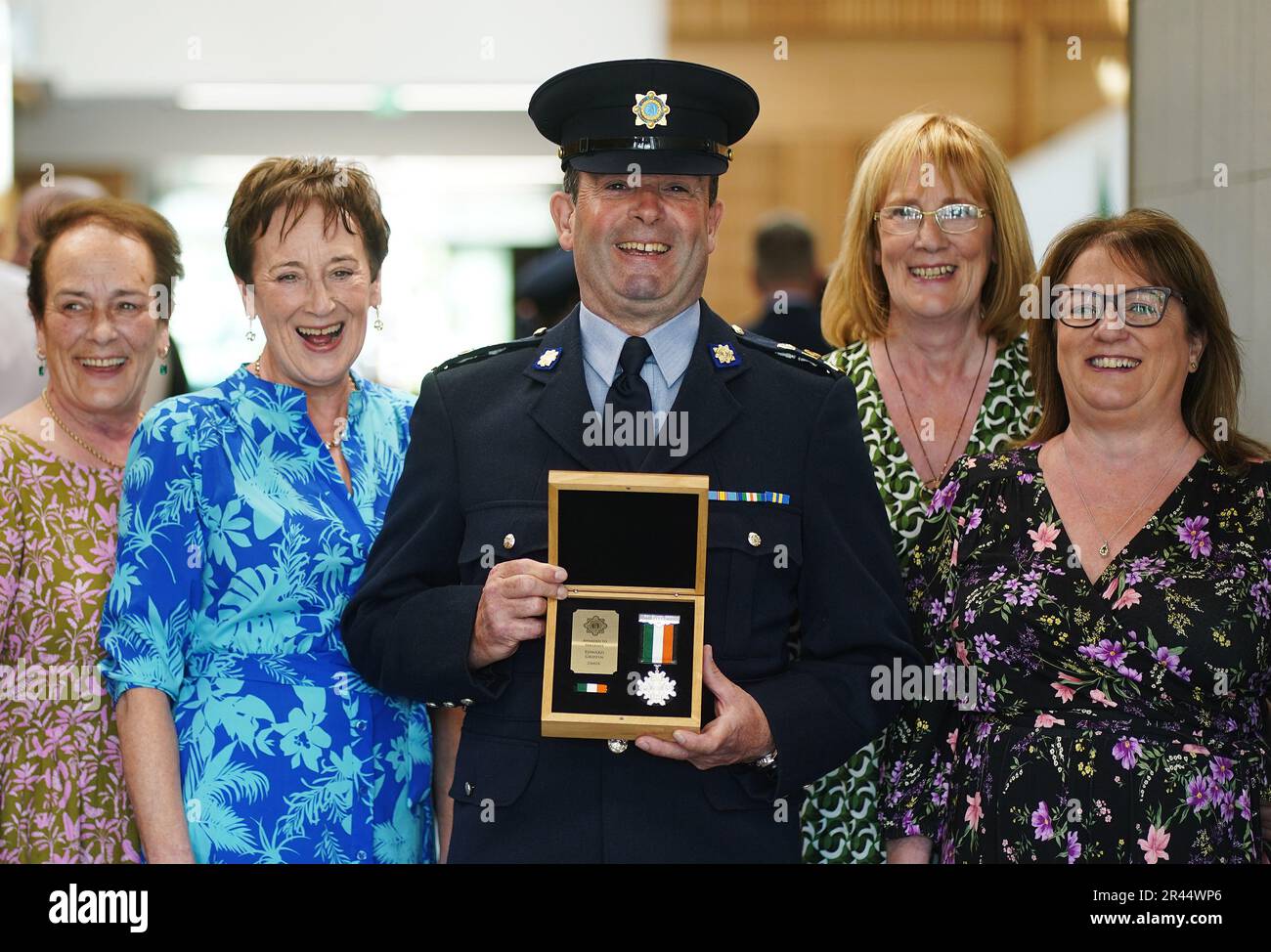 Sergeant Edward Griffin with four of his sisters after he was awarded a ...