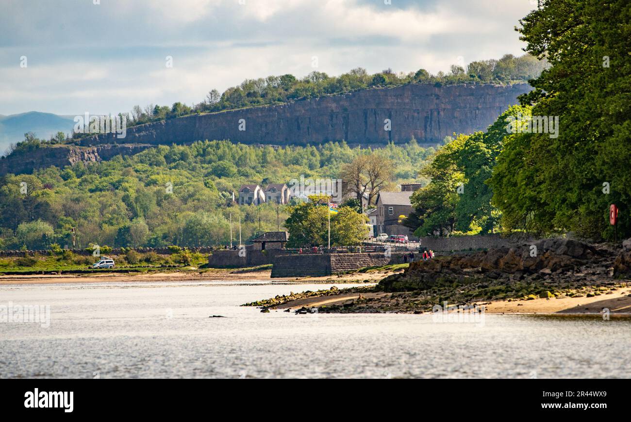 View of Arnside, Milnthorpe, Cumbria, UK with Haverbrack Bank limestone ...