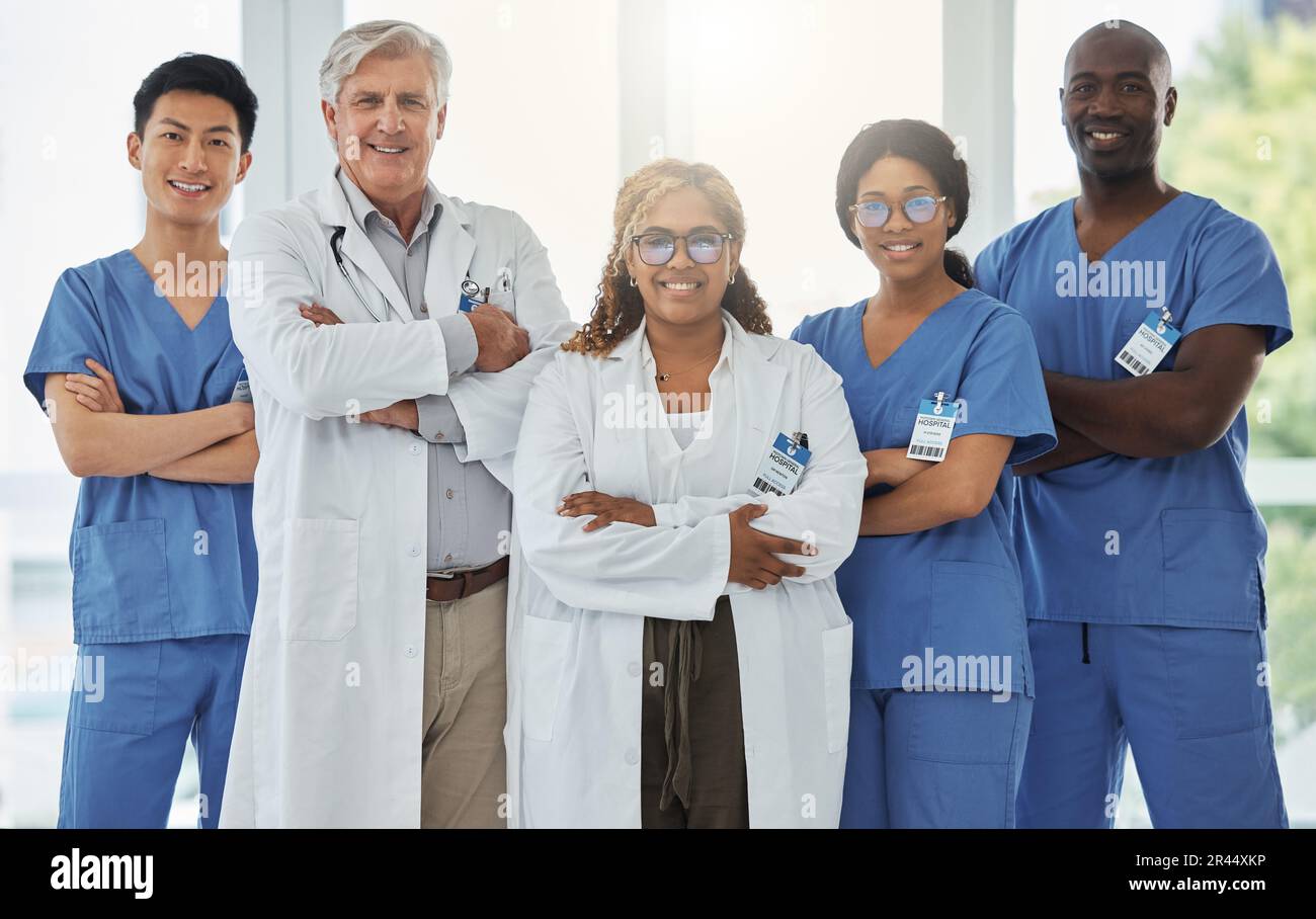 Leadership portrait, smile and doctors with arms crossed standing ...