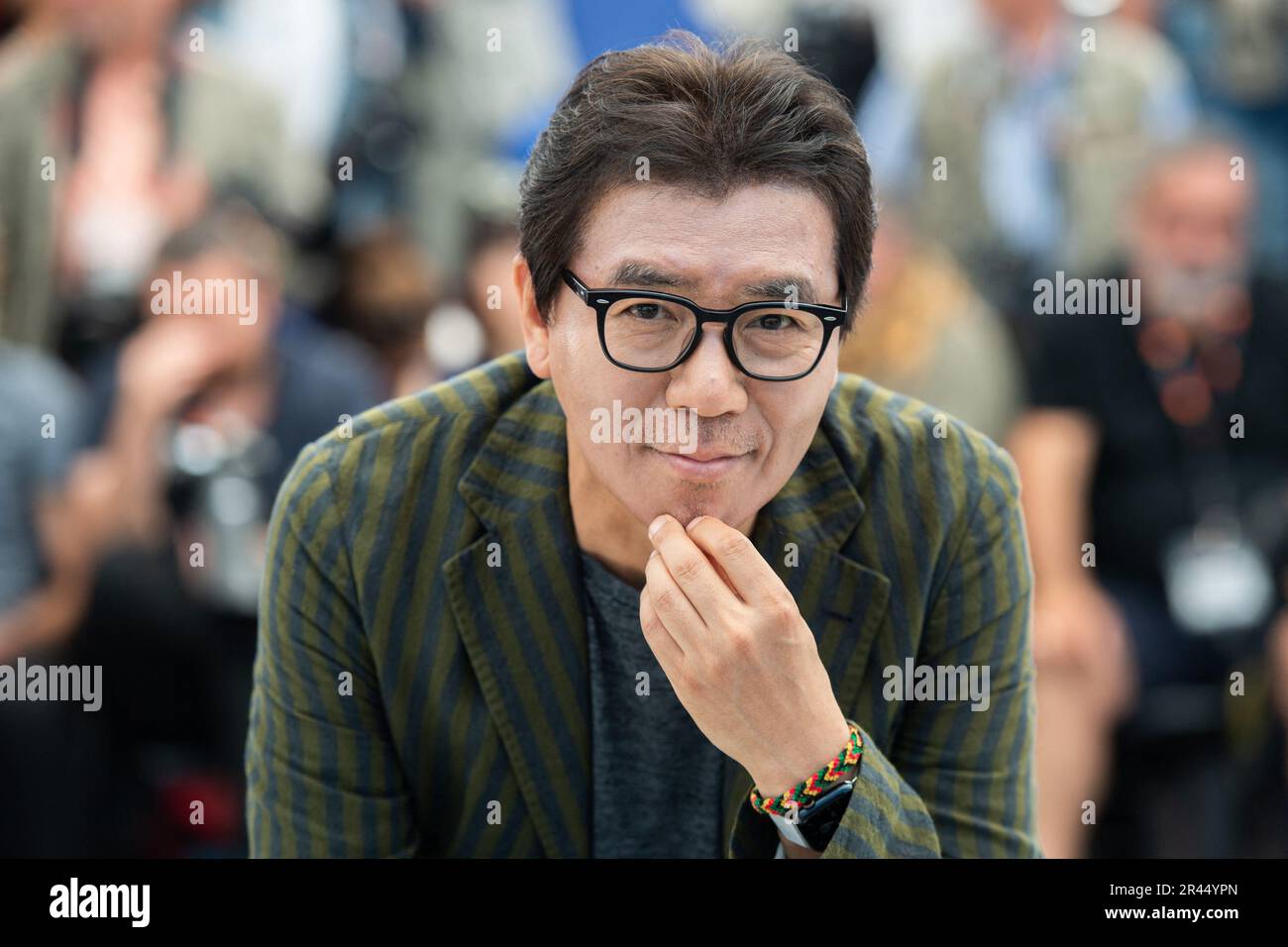 Cannes, France. 26th May, 2023. Kim Ji-woon attending the Cobweb (Dans La Toile) Photocall as ...