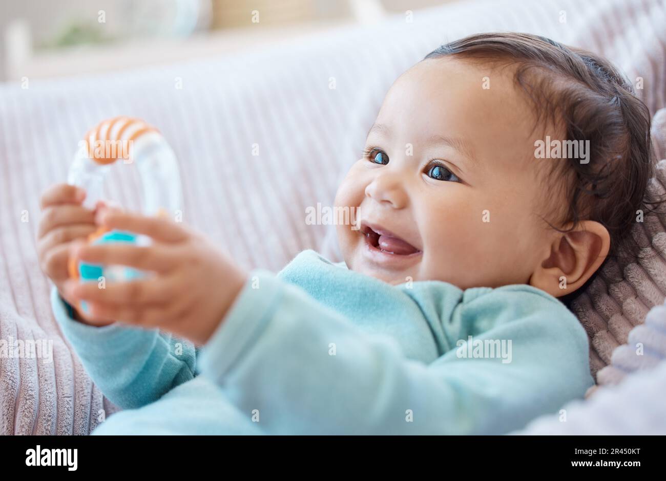 Happy baby, rattle and child in bedroom for childhood development ...