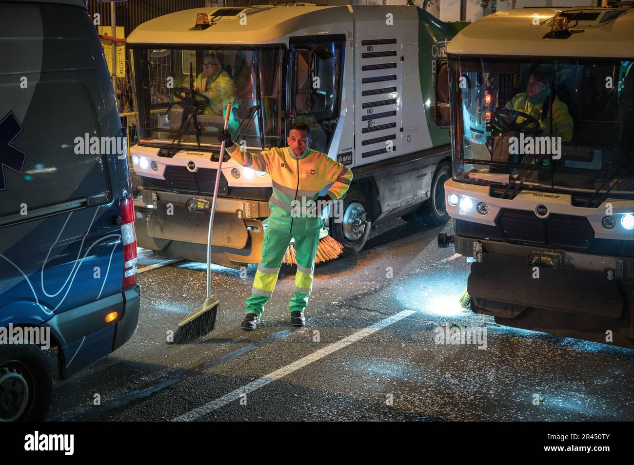 Street sweeper from Barcelona with his broom working in the street at ...