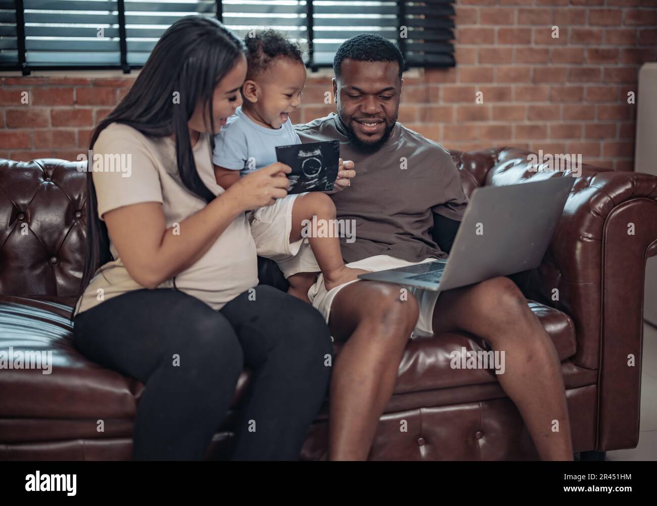 Family members see ultrasound images showing gender, health ...