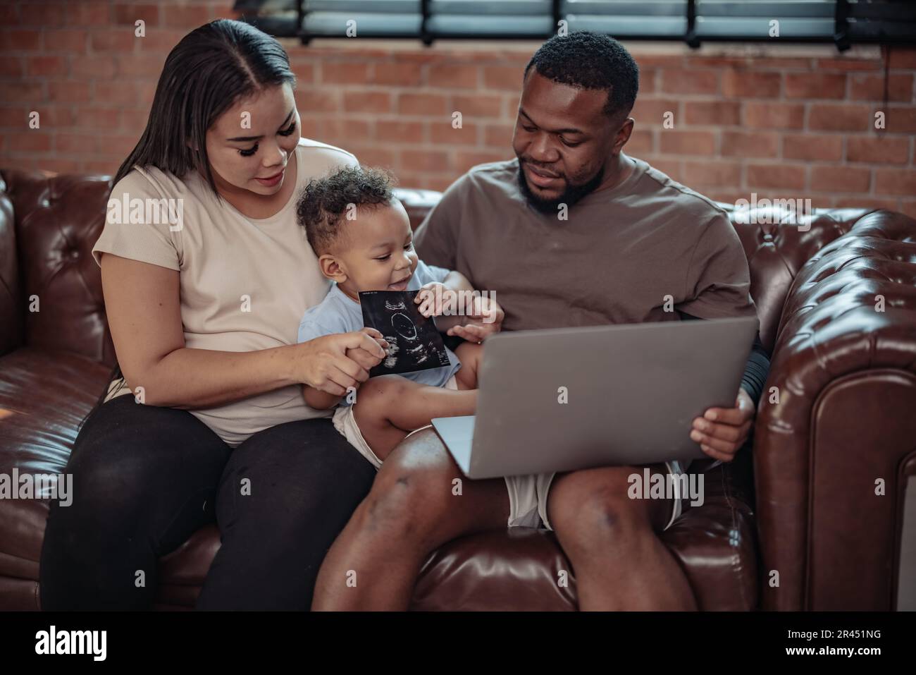 Family members see ultrasound images showing gender, health ...