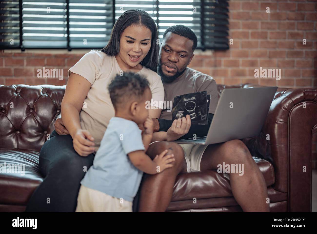 Family members see ultrasound images showing gender, health ...