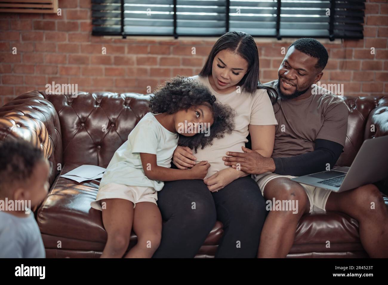 Family members see ultrasound images showing gender, health ...