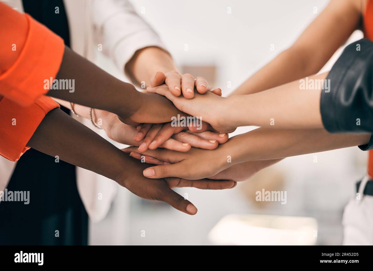 Hands stacked, support and group of people with teamwork, collaboration ...