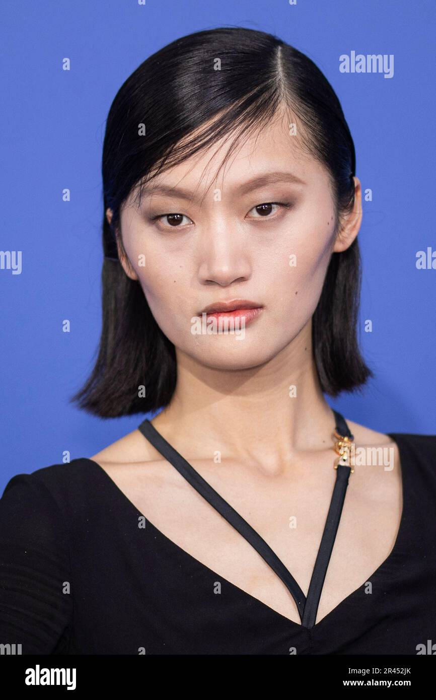Yilan Hua poses for photographers upon arrival at the amfAR Cinema ...