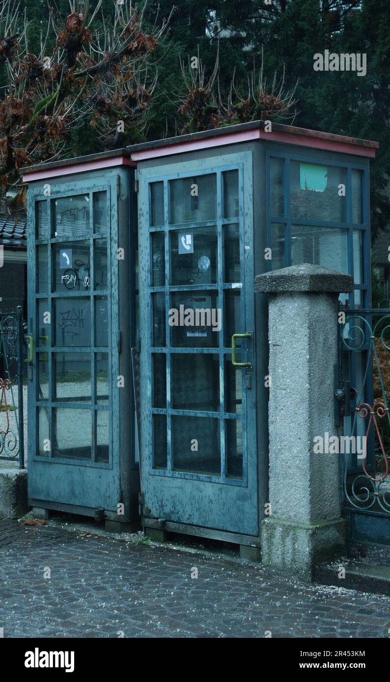 A vintage phone booth located on a city street corner Stock Photo - Alamy
