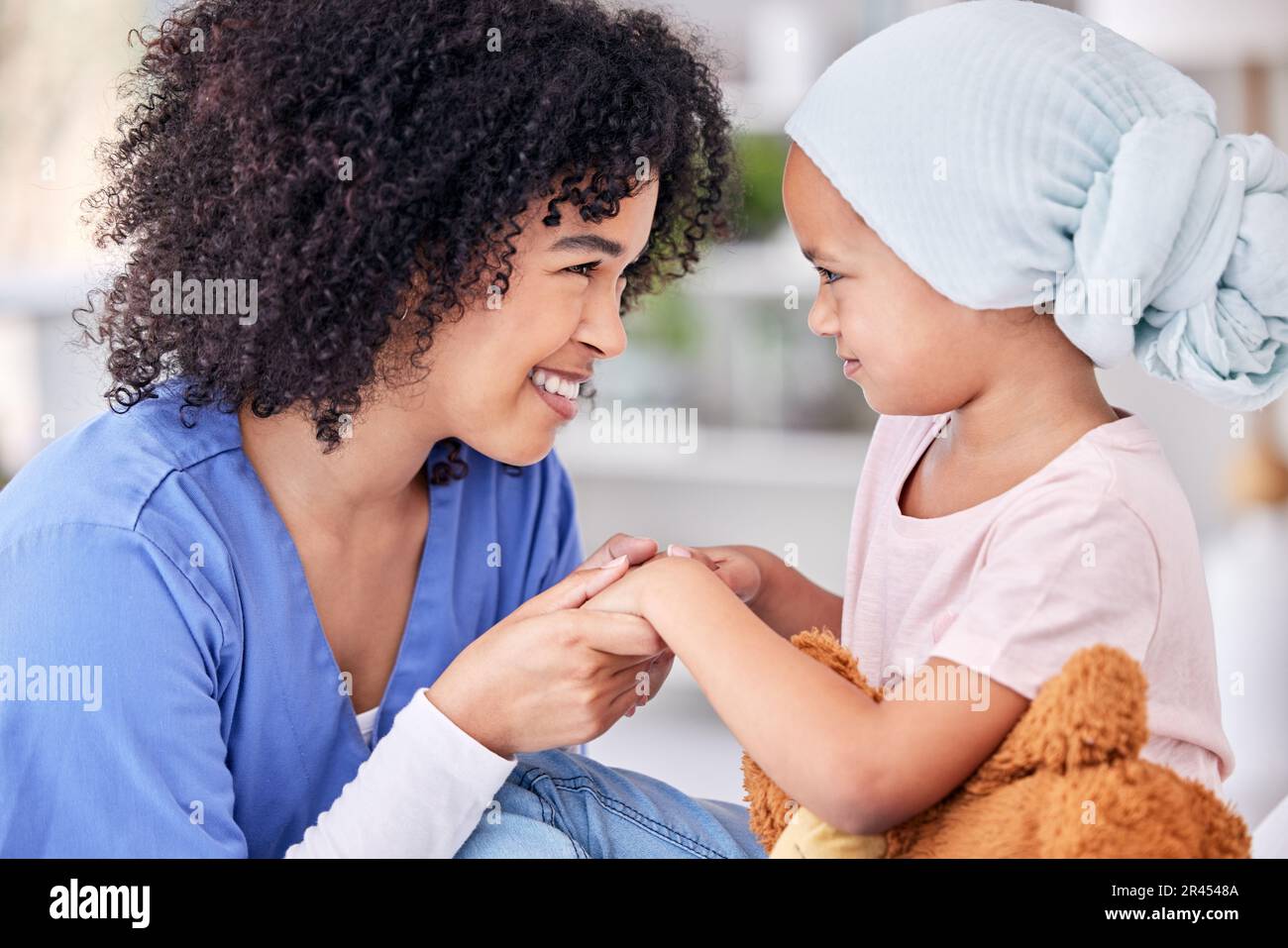 Smile, nurse and child on bed in hospital for children, health and ...